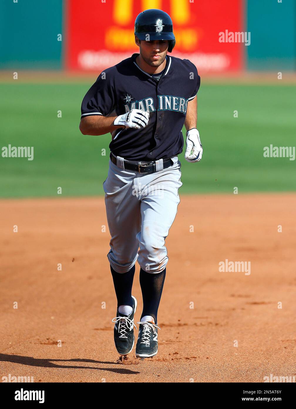 Seattle Mariners' Chris Taylor rounds the bases after hitting a grand ...
