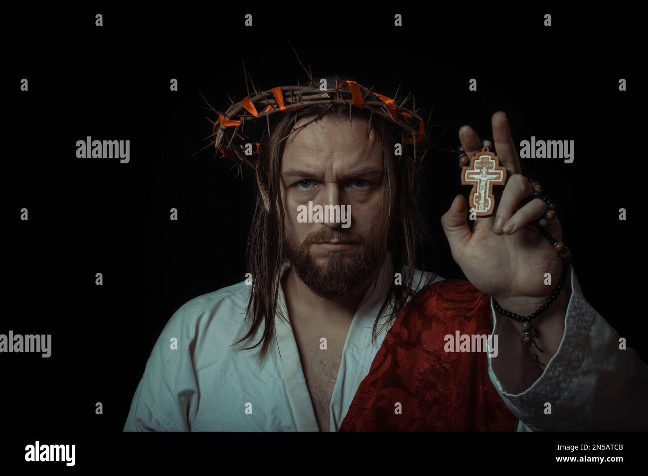 Jesus Christ wearing a crown of thorns and white chiton toga mantle ...