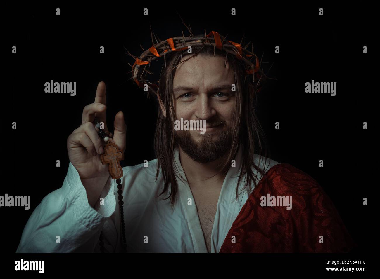 Jesus Christ wearing a crown of thorns and white chiton toga mantle ...