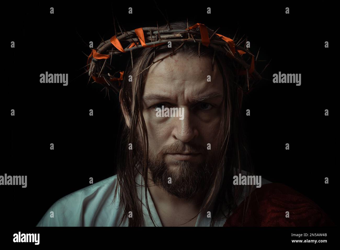 Jesus Christ wearing a crown of thorns and white chiton toga mantle ...
