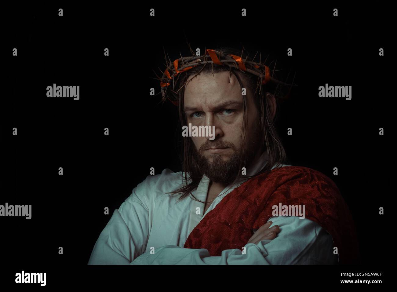 Jesus Christ wearing a crown of thorns and white chiton toga mantle ...