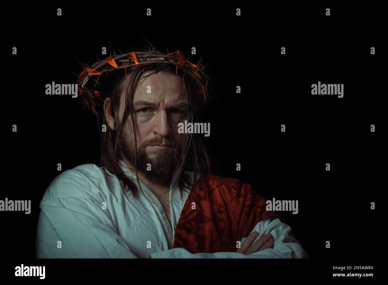 Jesus Christ wearing a crown of thorns and white chiton toga mantle ...