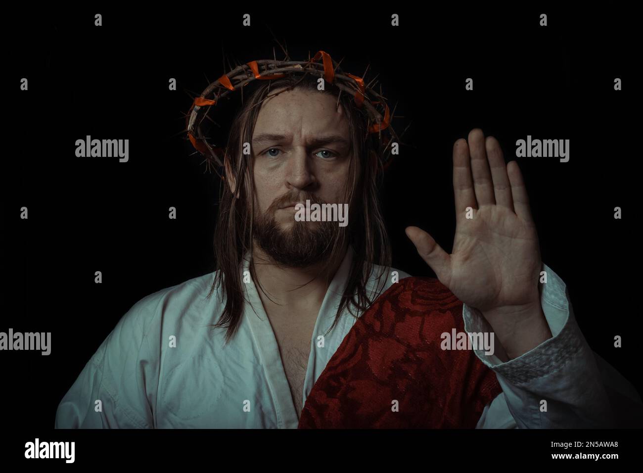 Jesus Christ wearing a crown of thorns and white chiton toga mantle ...