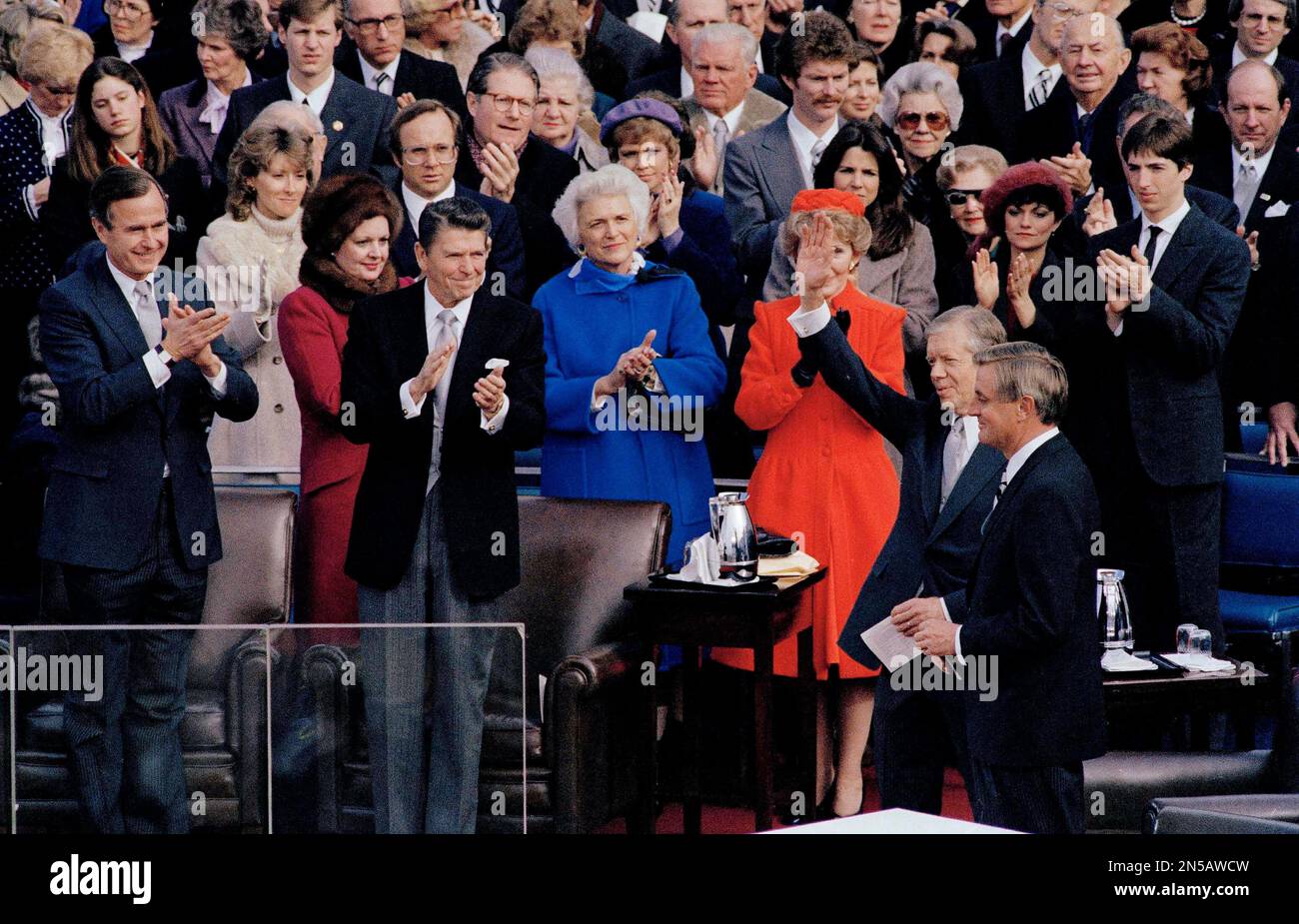 Outgoing President Jimmy Carter waves to the crowd at the inauguration ...