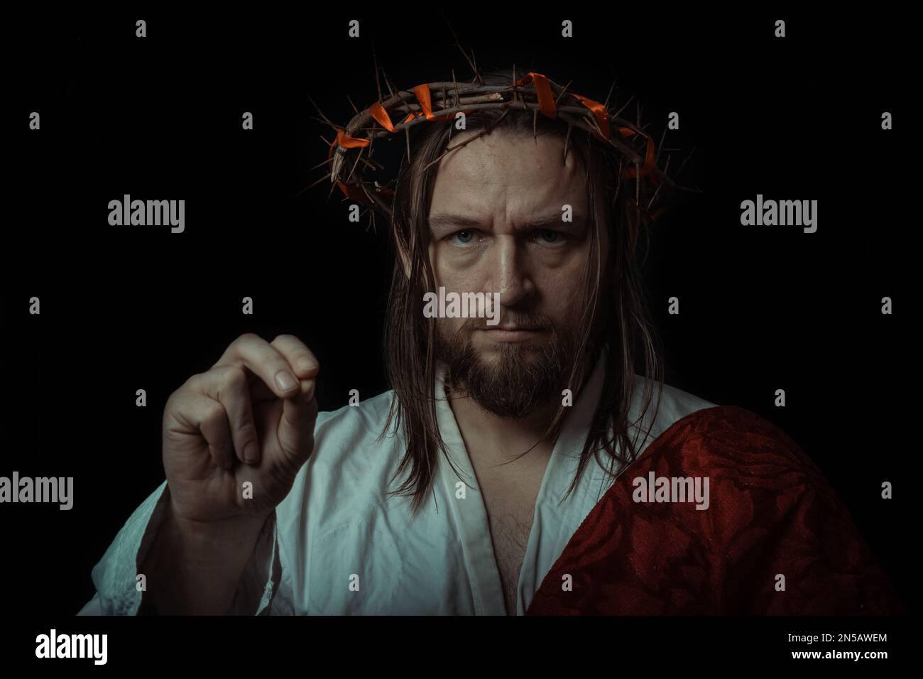 Jesus Christ wearing a crown of thorns and white chiton toga mantle ...