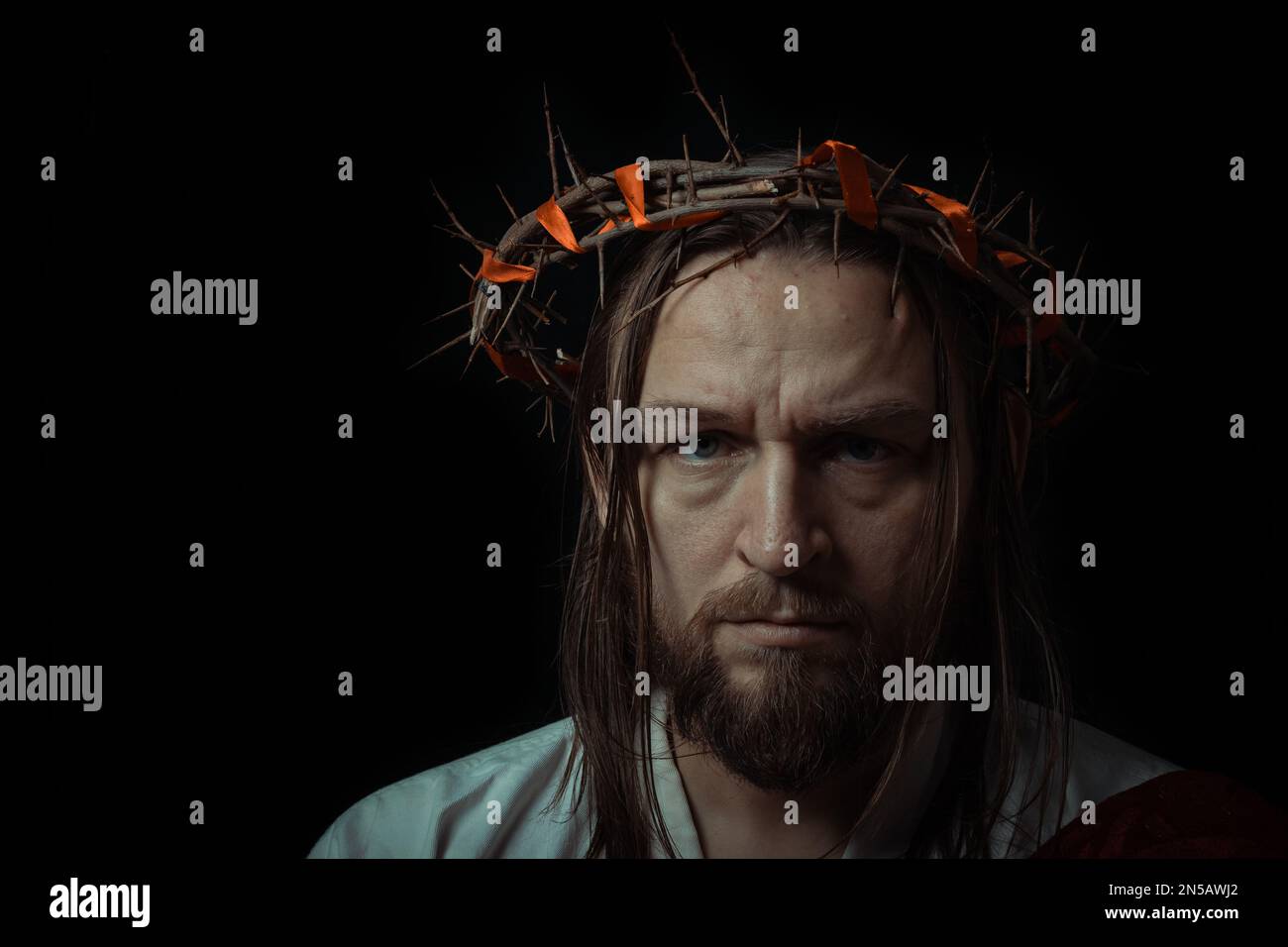 Jesus Christ wearing a crown of thorns and white chiton toga mantle ...