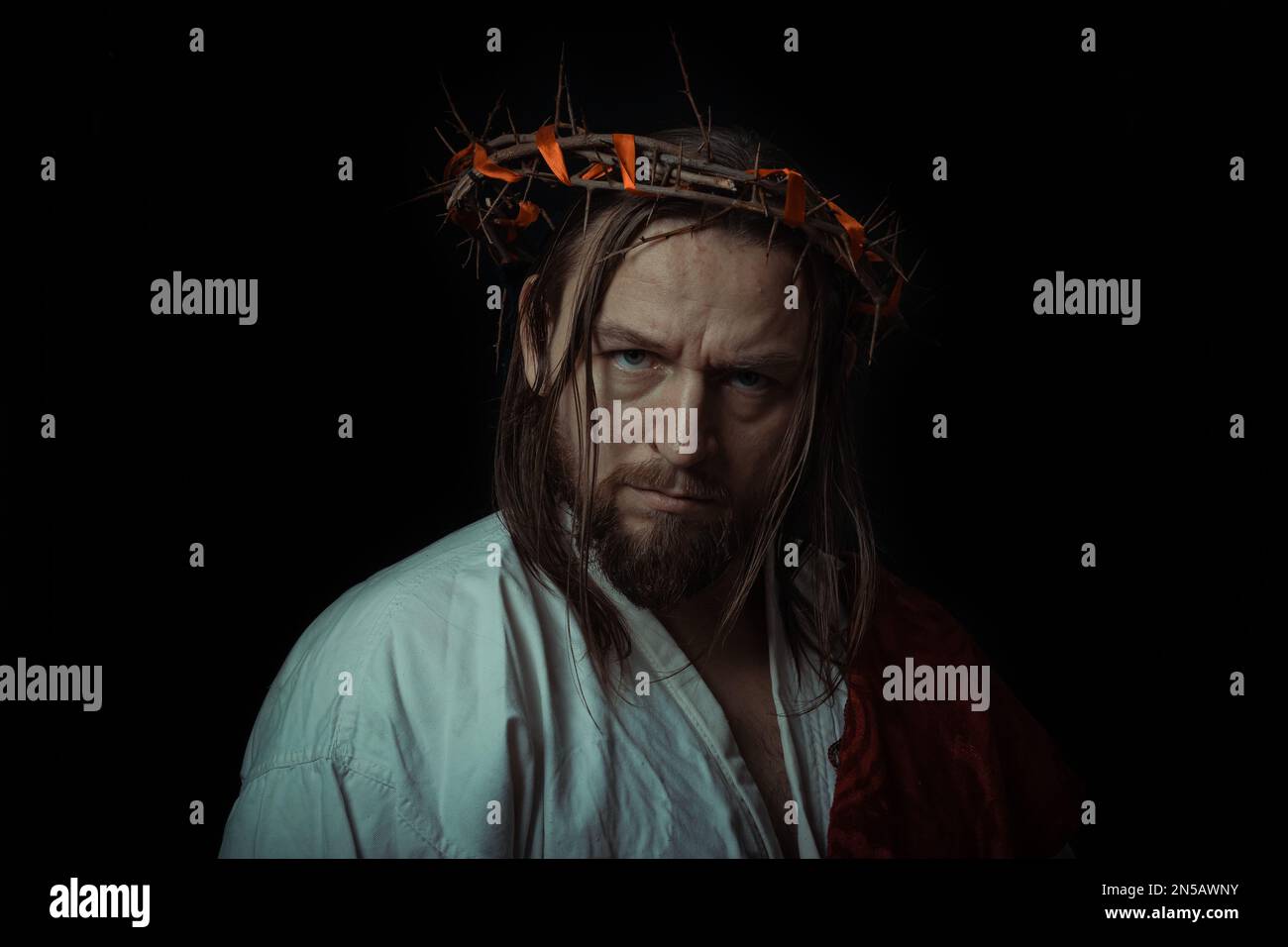 Jesus Christ wearing a crown of thorns and white chiton toga mantle ...