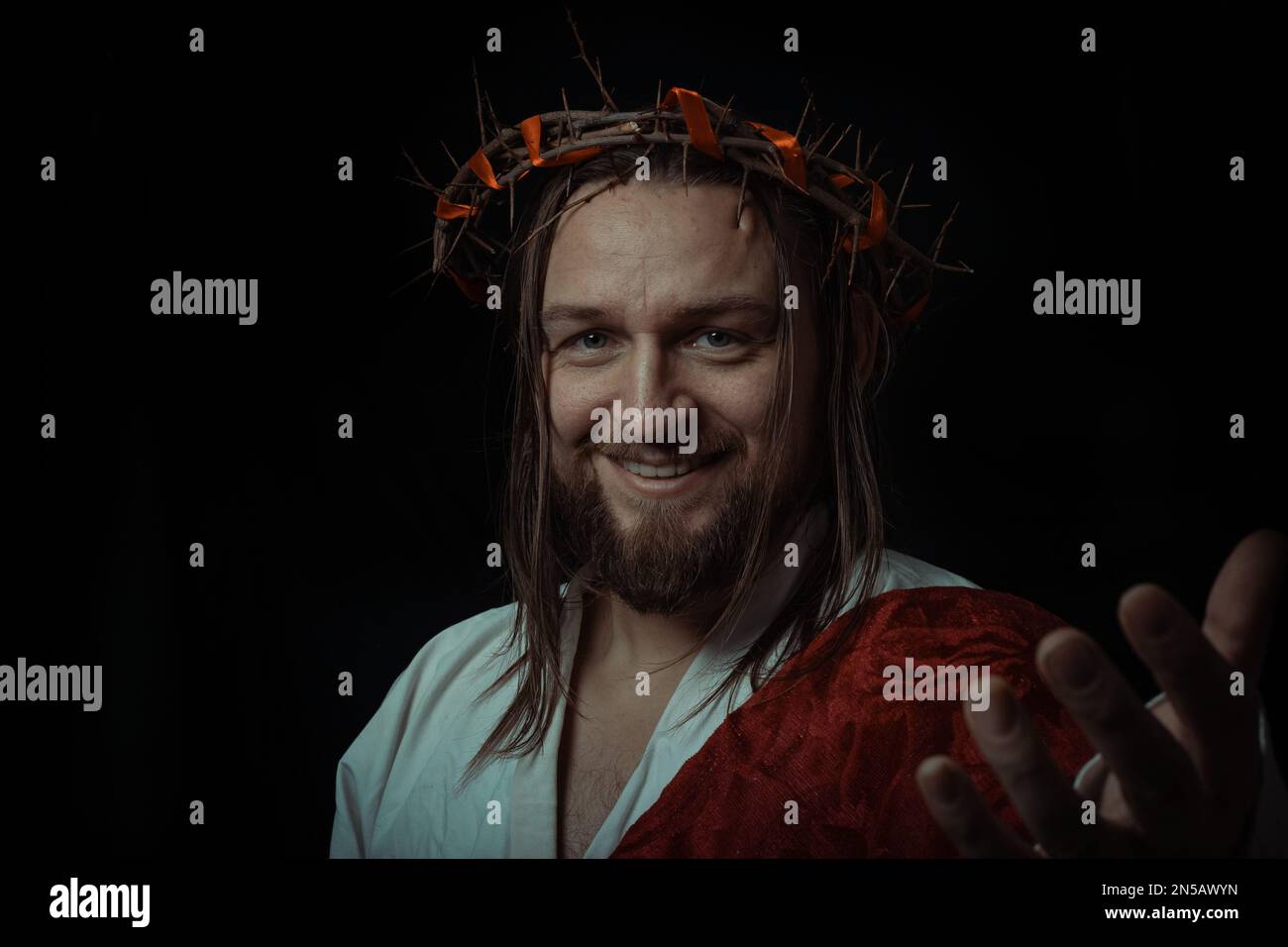 Jesus Christ wearing a crown of thorns and white chiton toga mantle ...