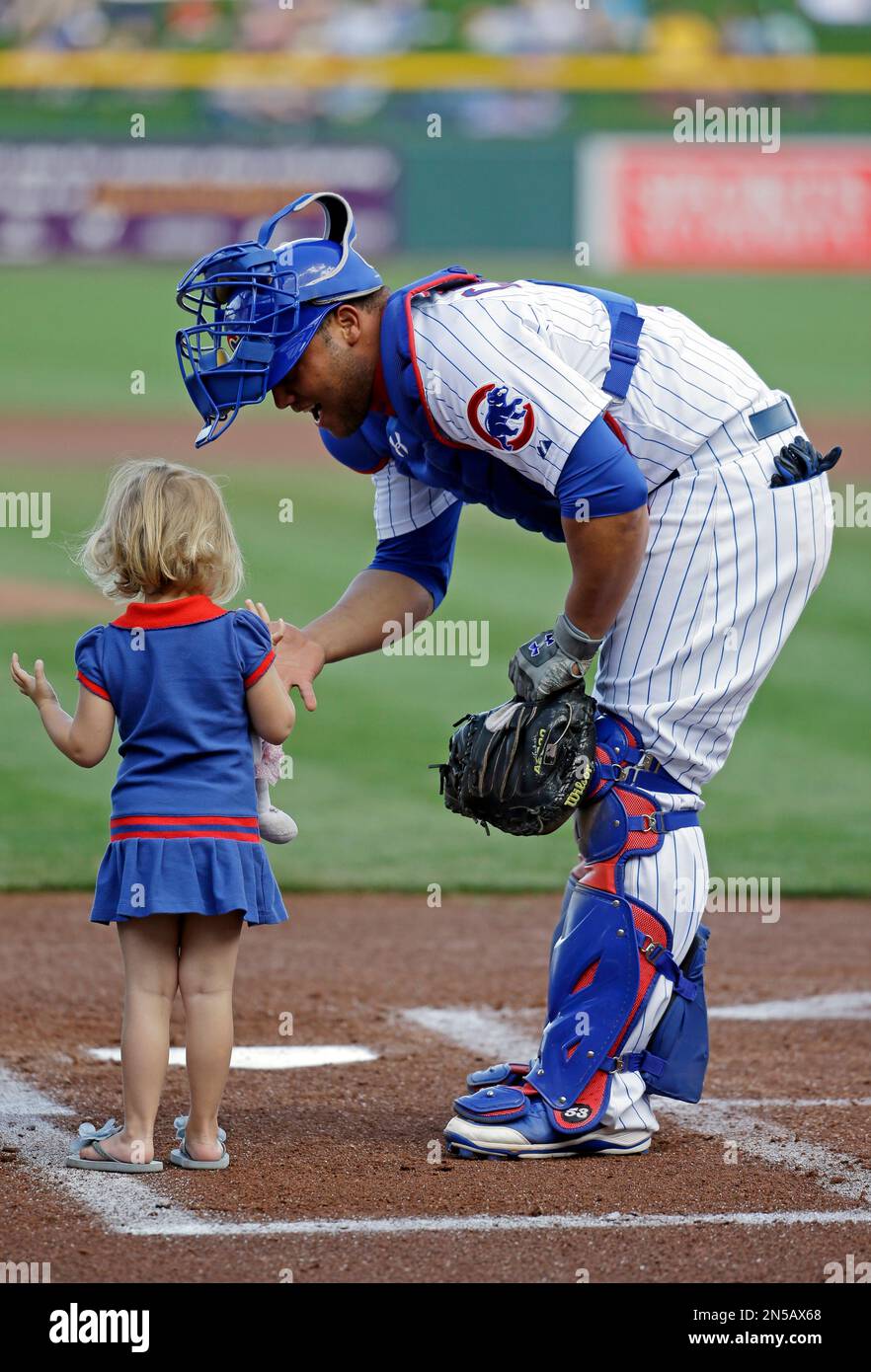 Chicago Cubs catcher Welington Castillo signs an autograph before an ...