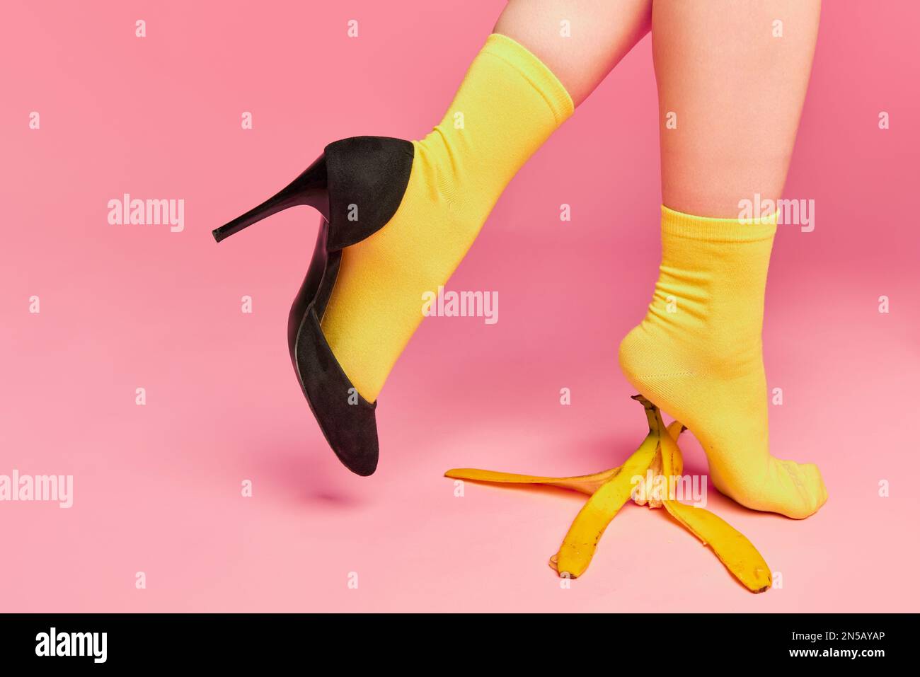 Creative colorful portrait of female leg in bright yellow socks and ...