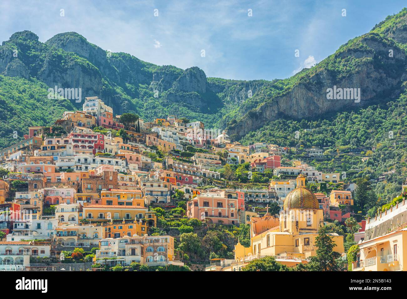 View of Positano town with colorful buildings and church of Our Lady of ...