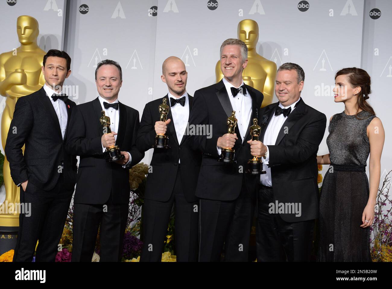 Presenters Joseph Gordon-Levitt, left, and Emma Watson, right, pose ...