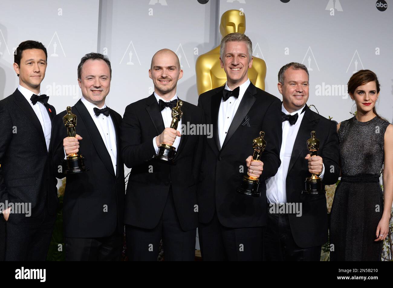 Presenters Joseph Gordon-Levitt, left, and Emma Watson, right, pose ...
