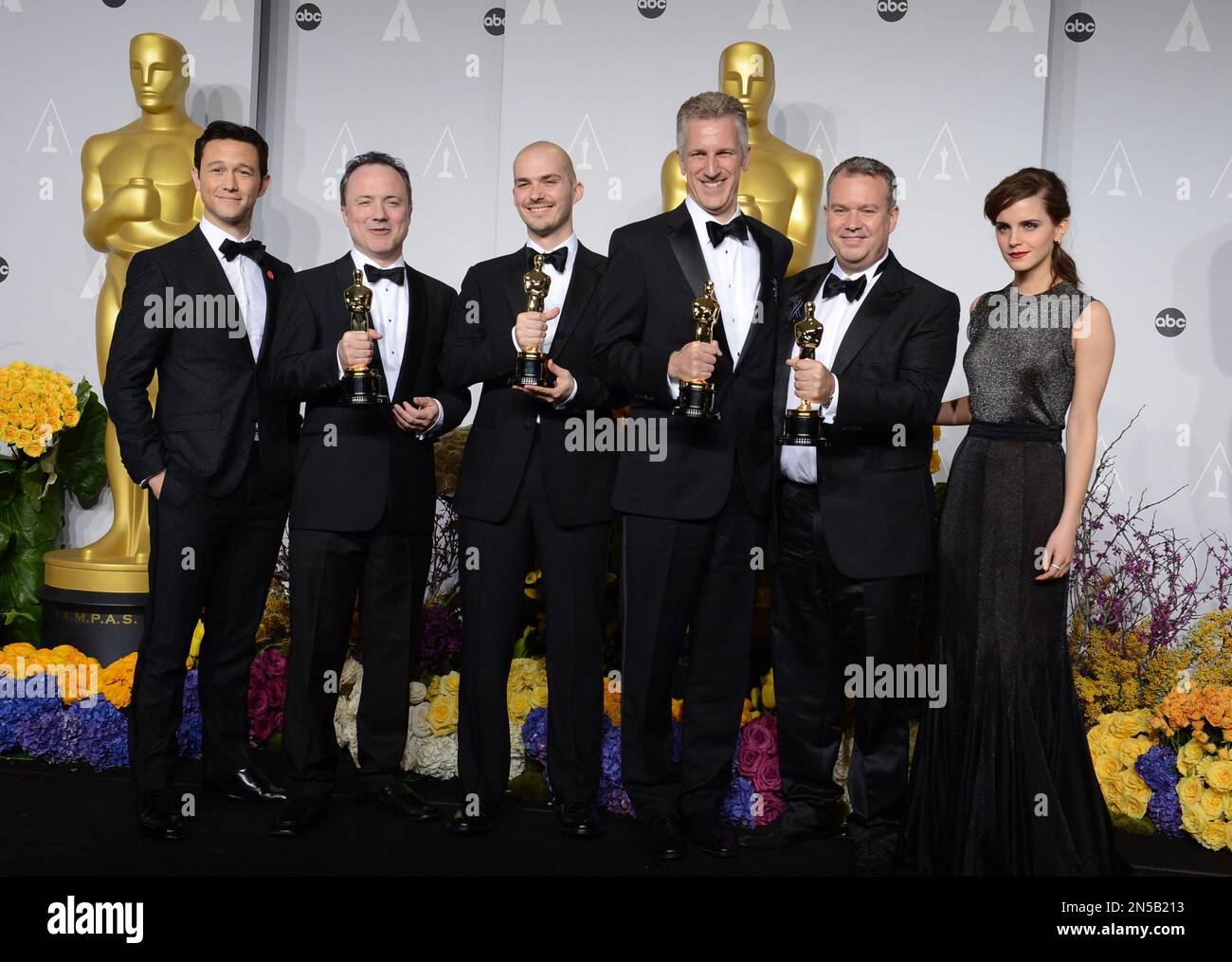 Presenters Joseph Gordon-Levitt, left, and Emma Watson, right, pose ...