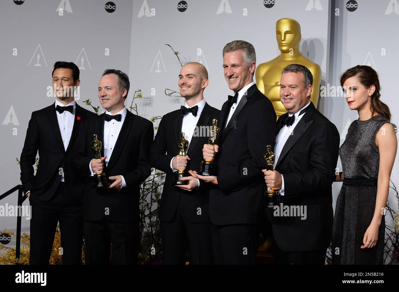 Presenters Joseph Gordon-Levitt, left, and Emma Watson, right, pose ...