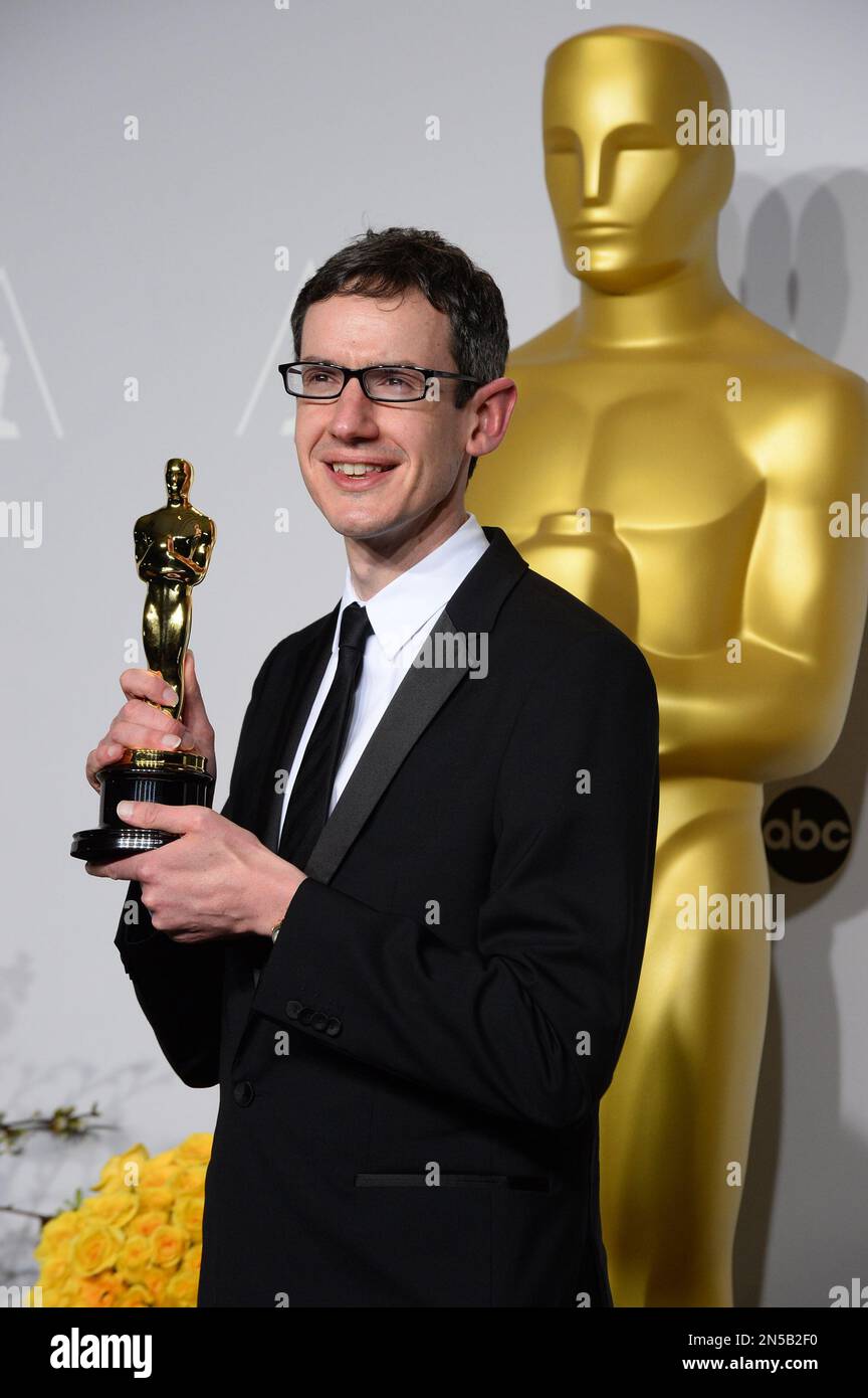 Steven Price poses in the press room with the award for original score ...
