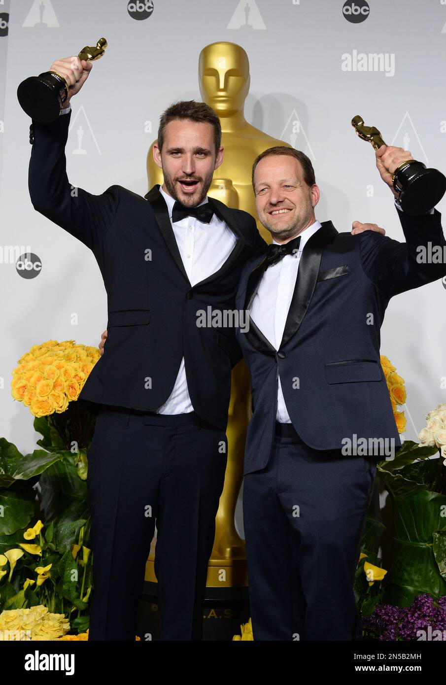 Anders Walter, left, and Kim Magnusson pose in the press room with the ...