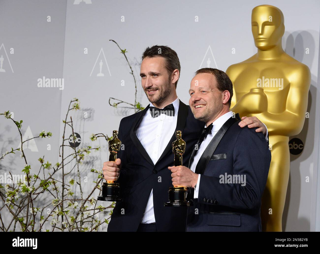 Anders Walter, left, and Kim Magnusson pose in the press room with the ...