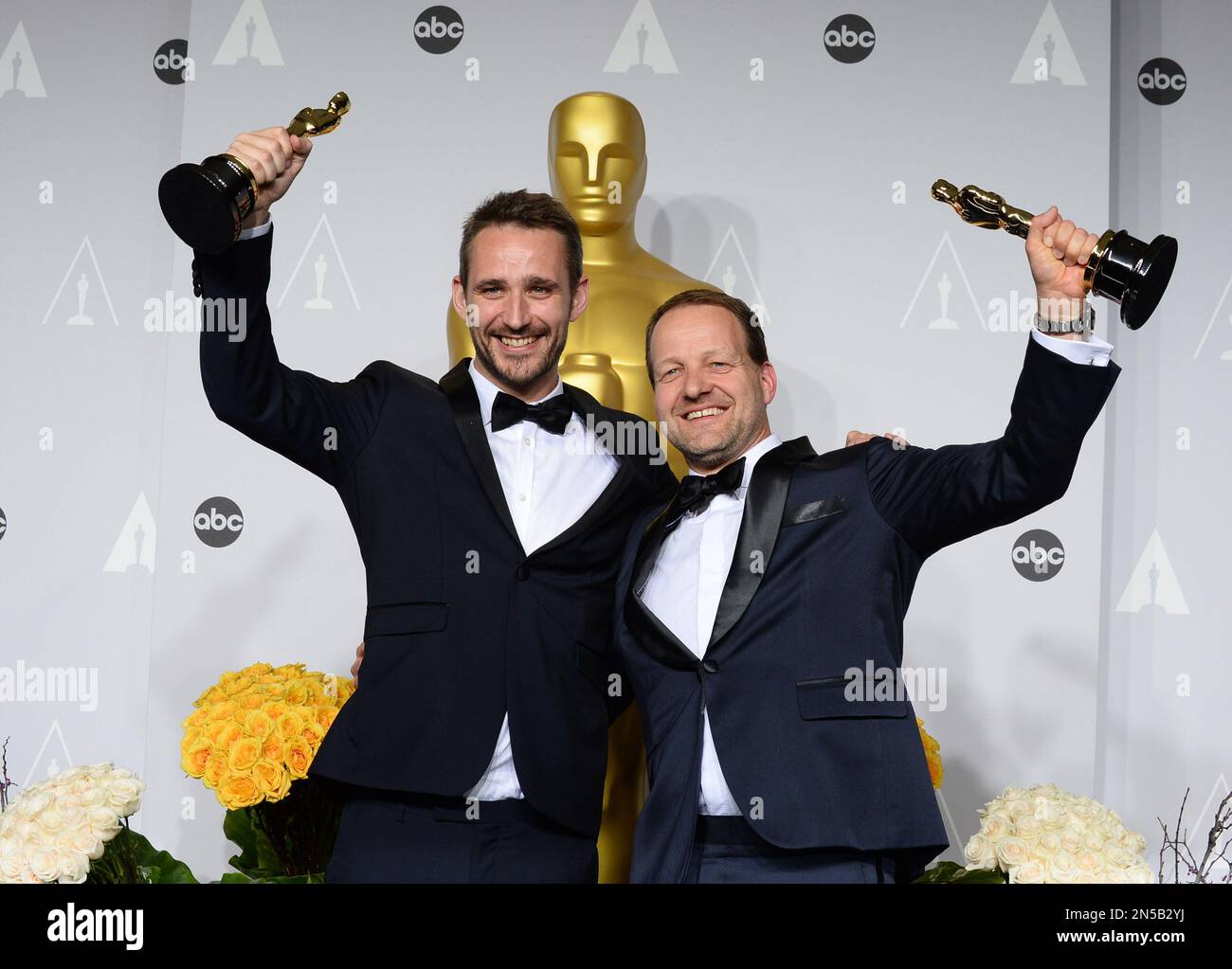 Anders Walter, left, and Kim Magnusson pose in the press room with the ...