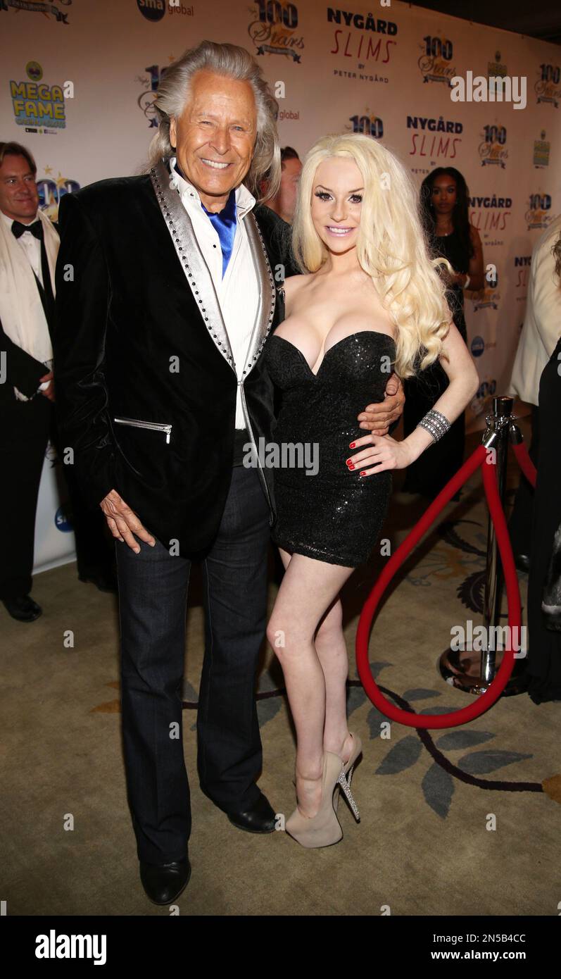 Peter Nygard, left, and Courtney Stodden arrive at the 24th Night of ...