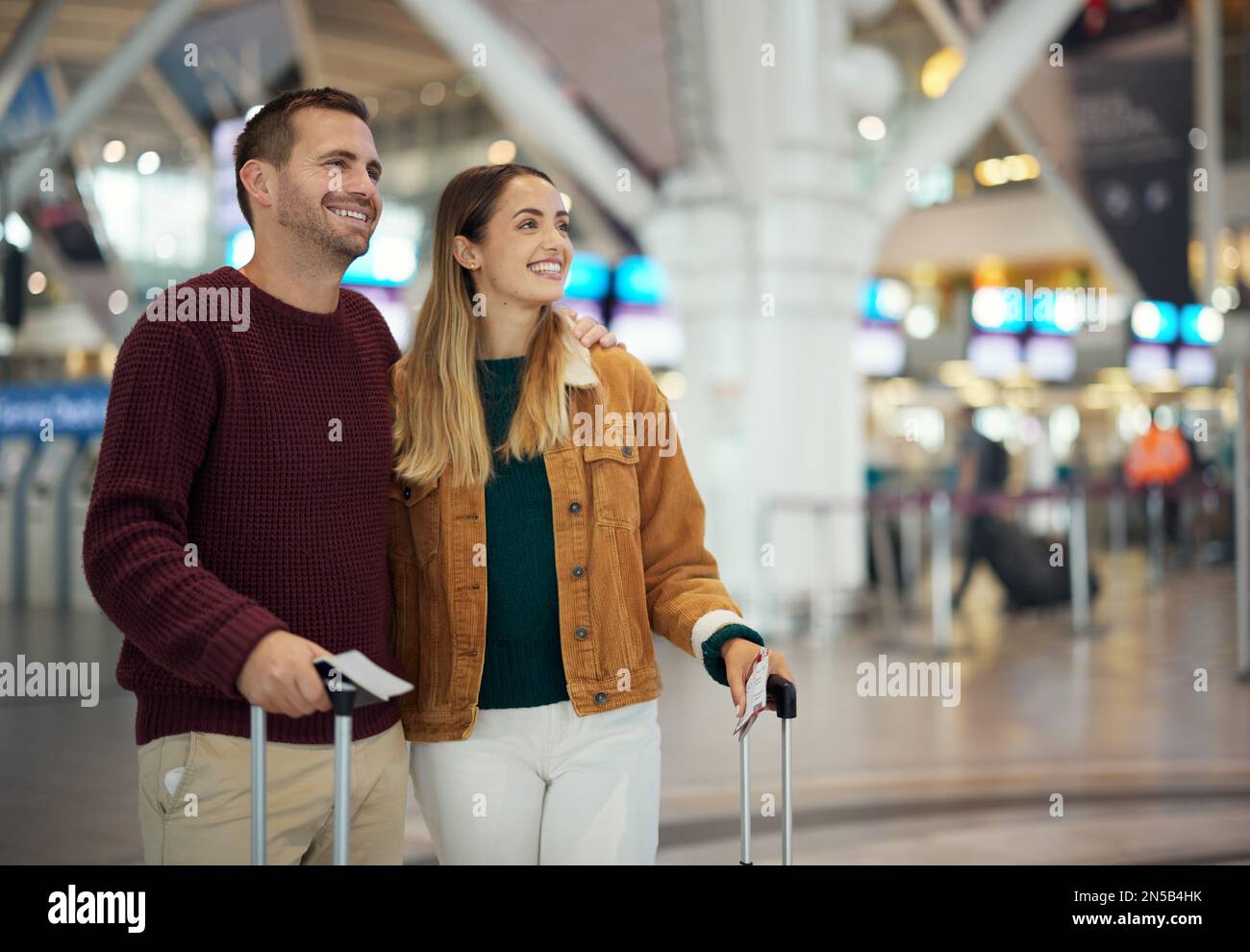 Couple at airport, travel together and holiday overseas with adventure ...