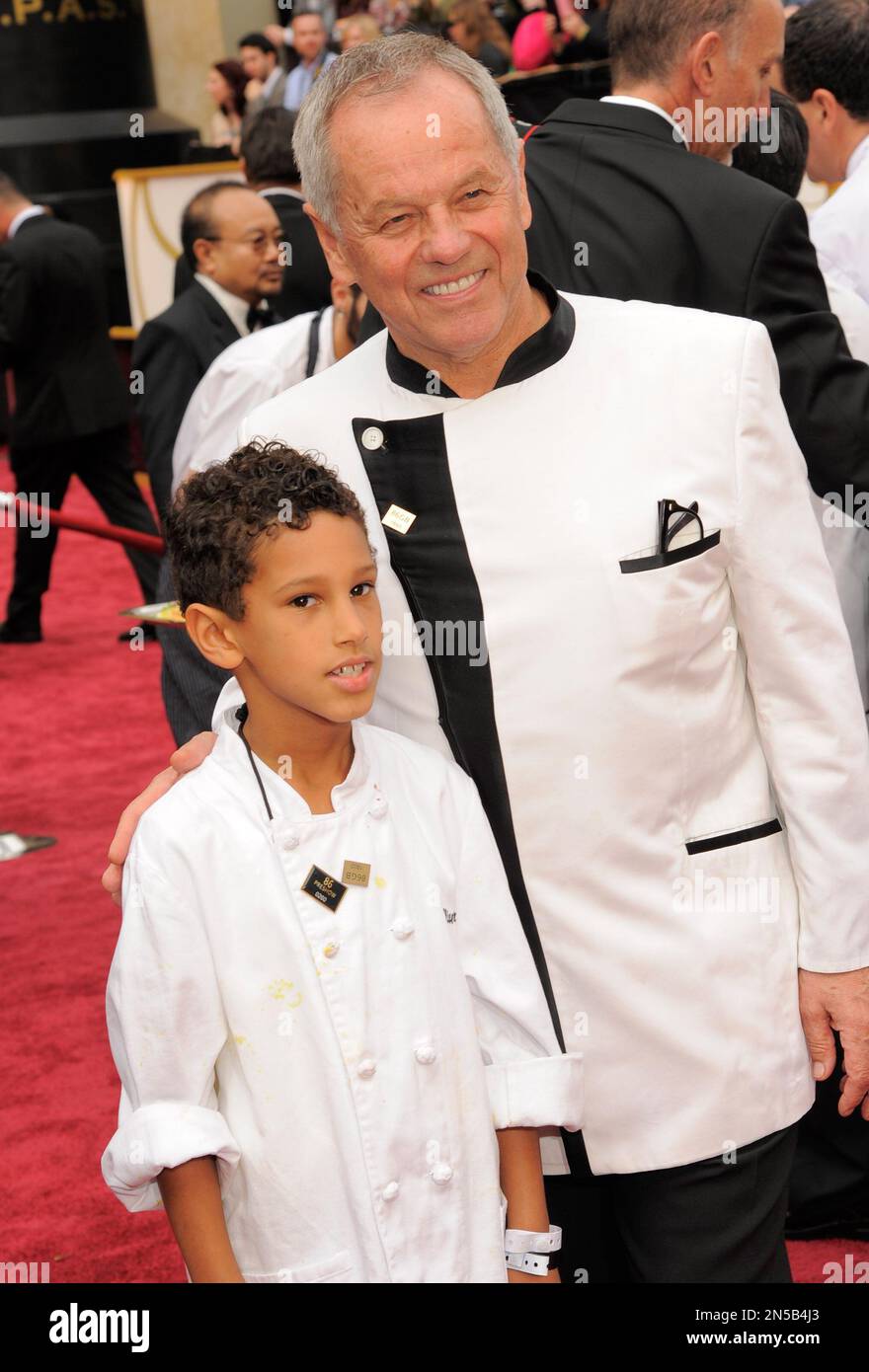 Oliver Wolfgang Puck, left and, Wolfgang Puck arrive at the Oscars on ...