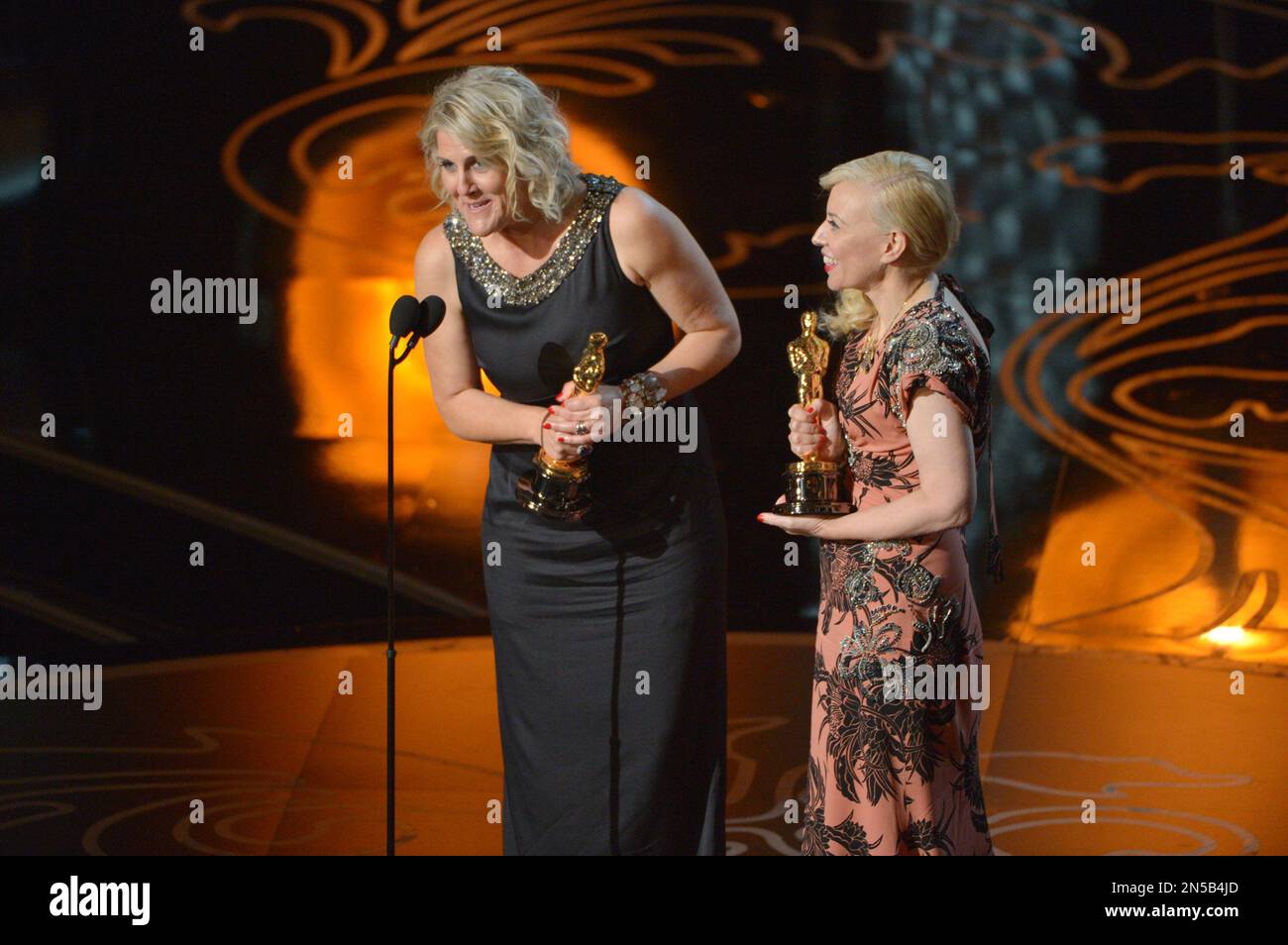 Beverley Dunn, left, and Catherine Martin accept the award for best ...