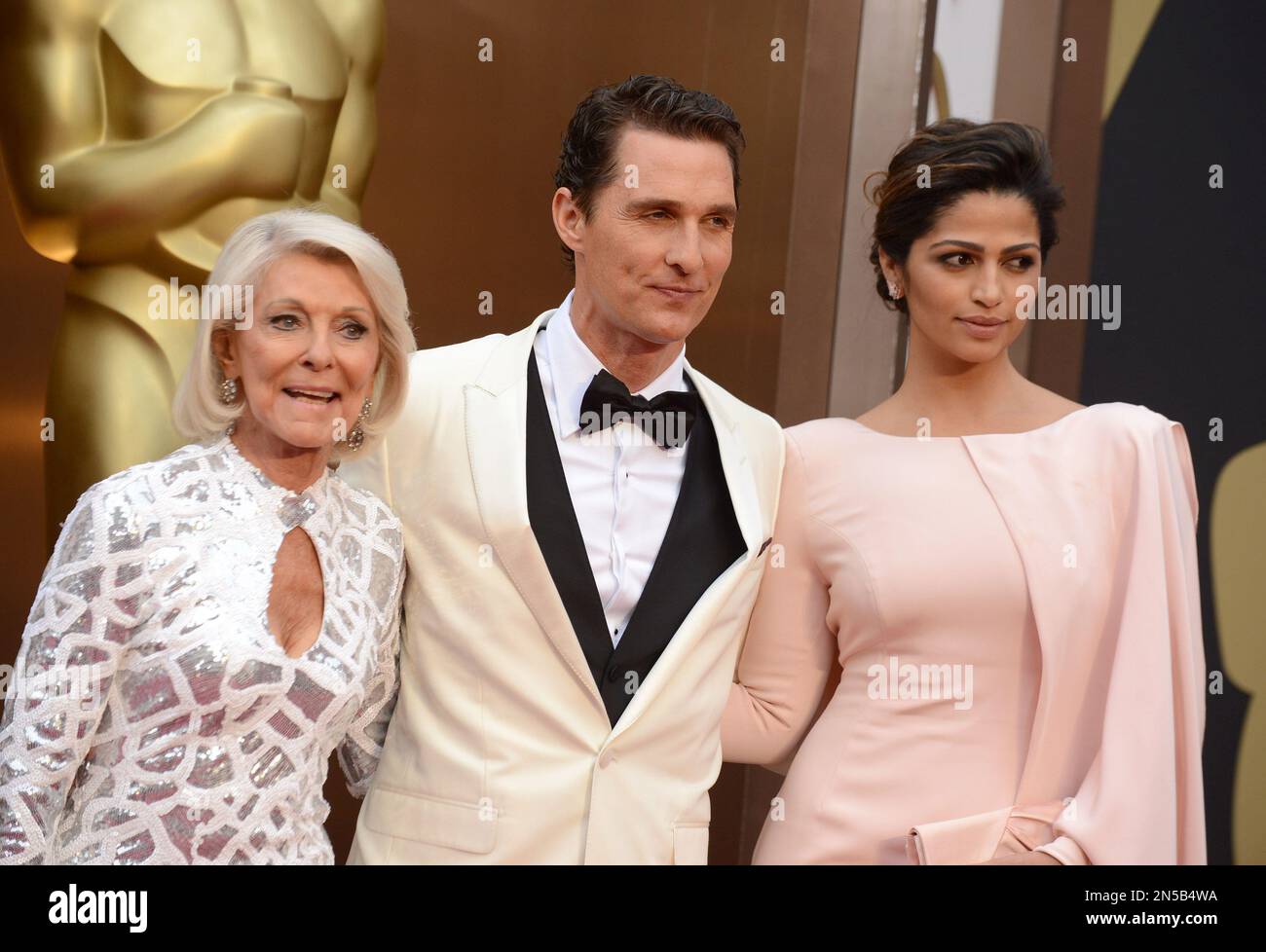From left, Mary Kathlene McCabe, Matthew McConaughey and Camila Alves ...