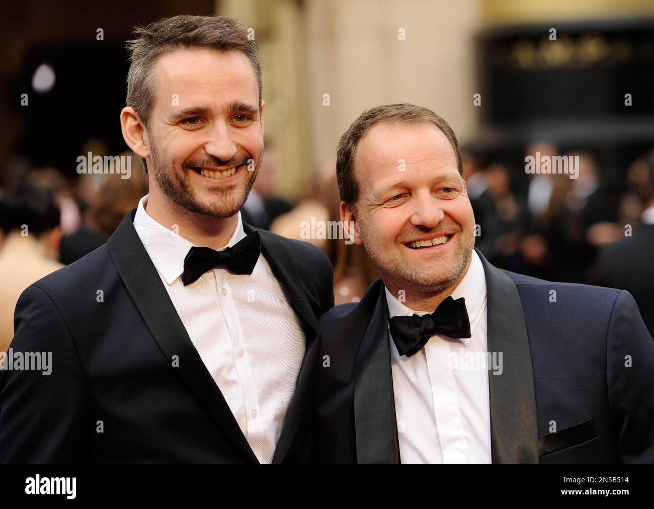 AndersWalter, left, and KimMagnusson arrive at the Oscars on Sunday ...