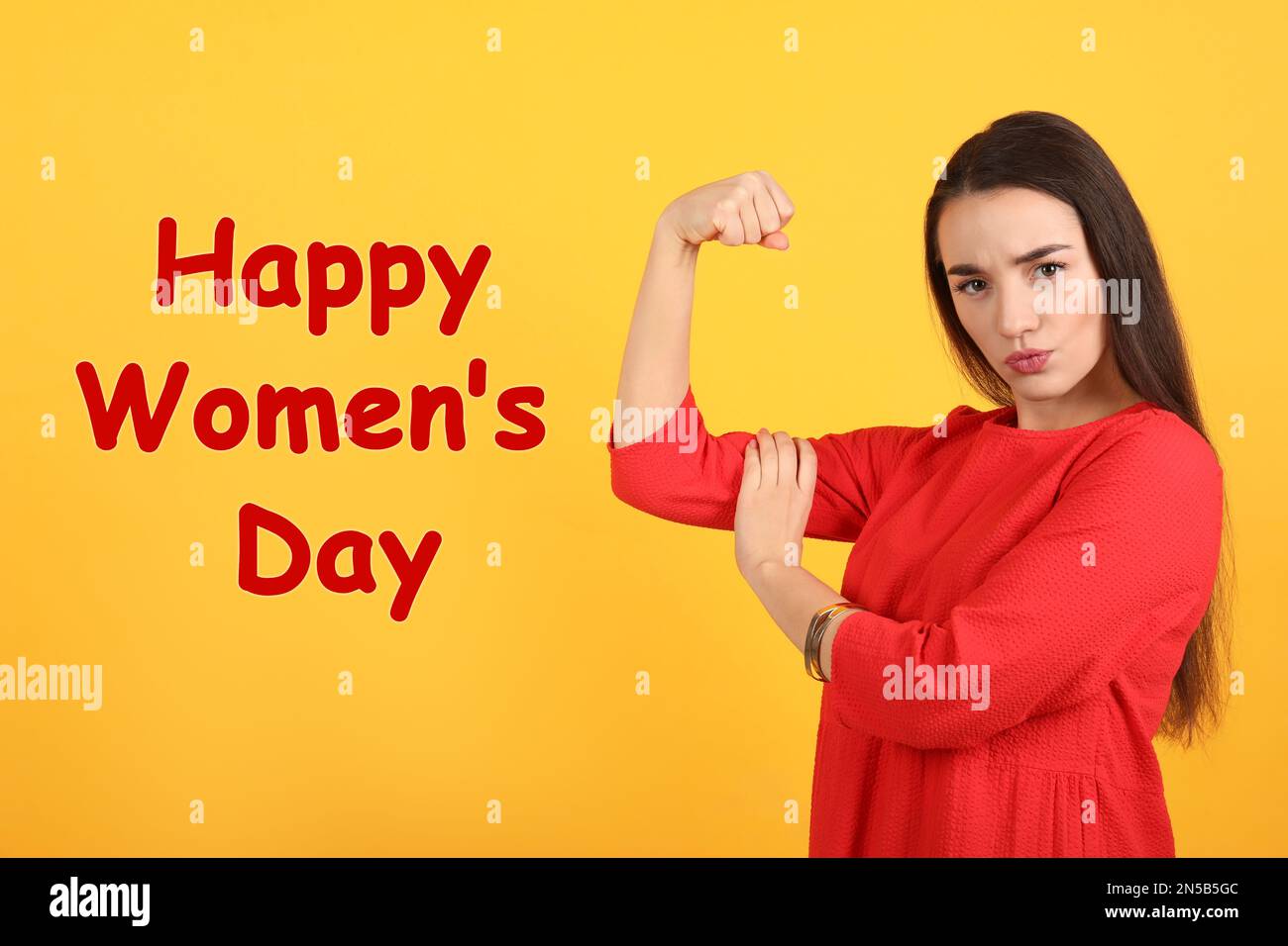 Strong woman as symbol of girl power on yellow background. Happy Women ...