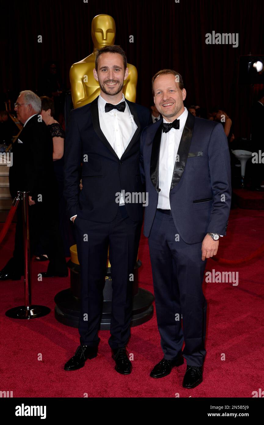 Anders Walter, left, and Kim Magnusson arrive at the Oscars on Sunday ...