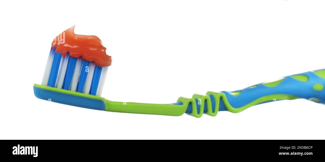 Manual child toothbrush with paste isolated on white Stock Photo - Alamy