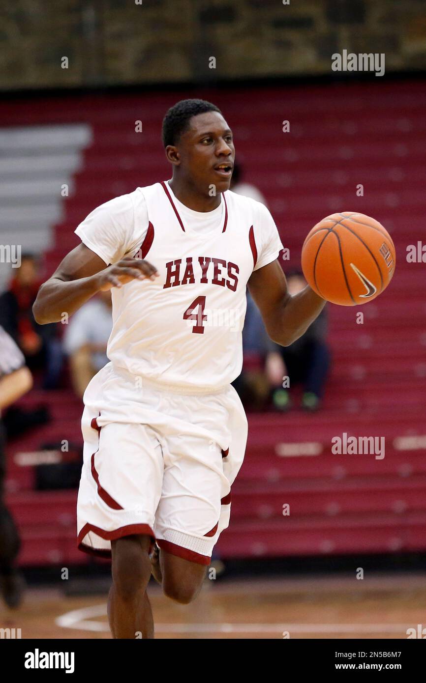 Cardinal Hayes Shavar Newkirk #4 in action against the Holy Cross ...