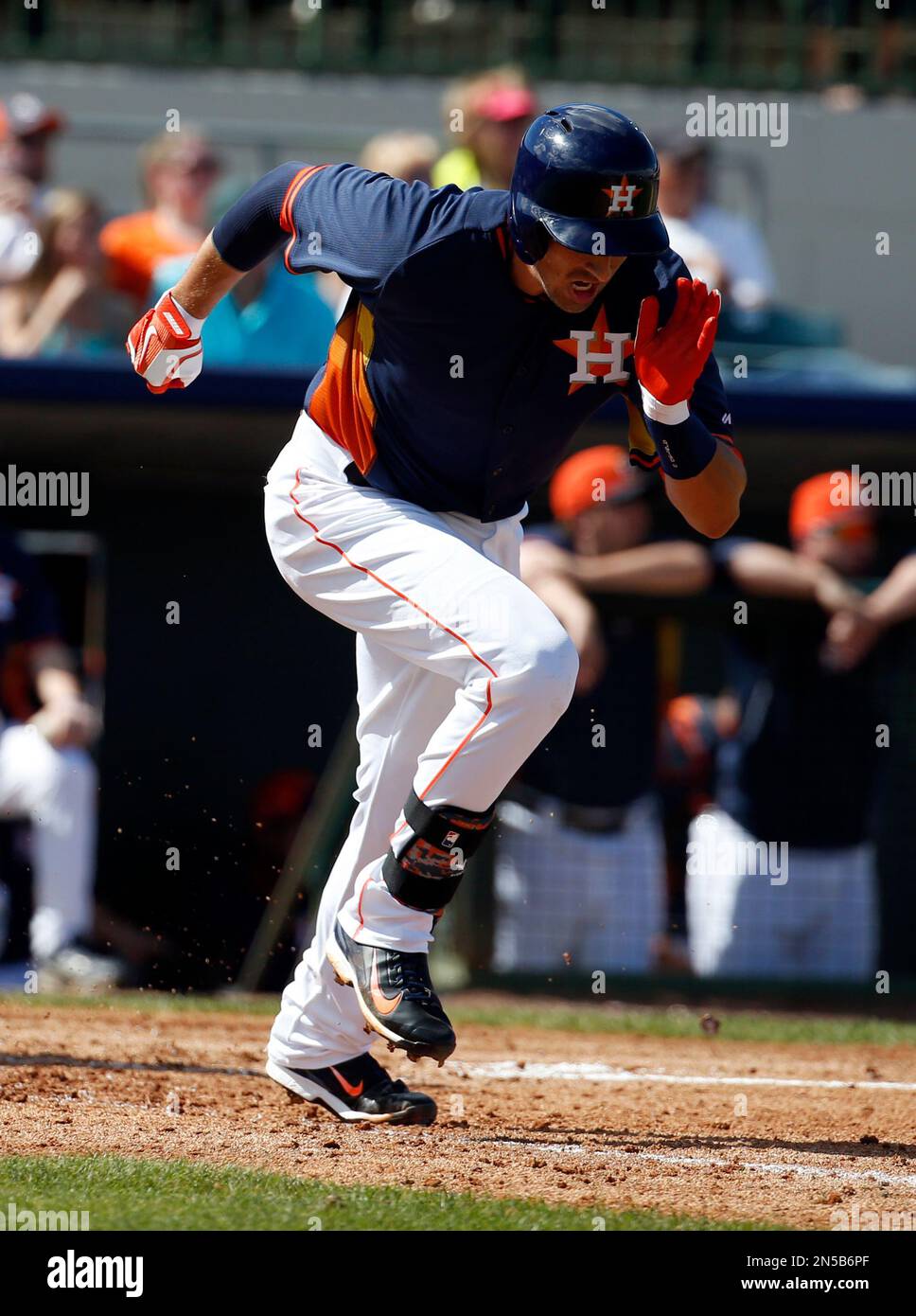 Houston Astros catcher Jason Castro (15) runs to first in a spring ...