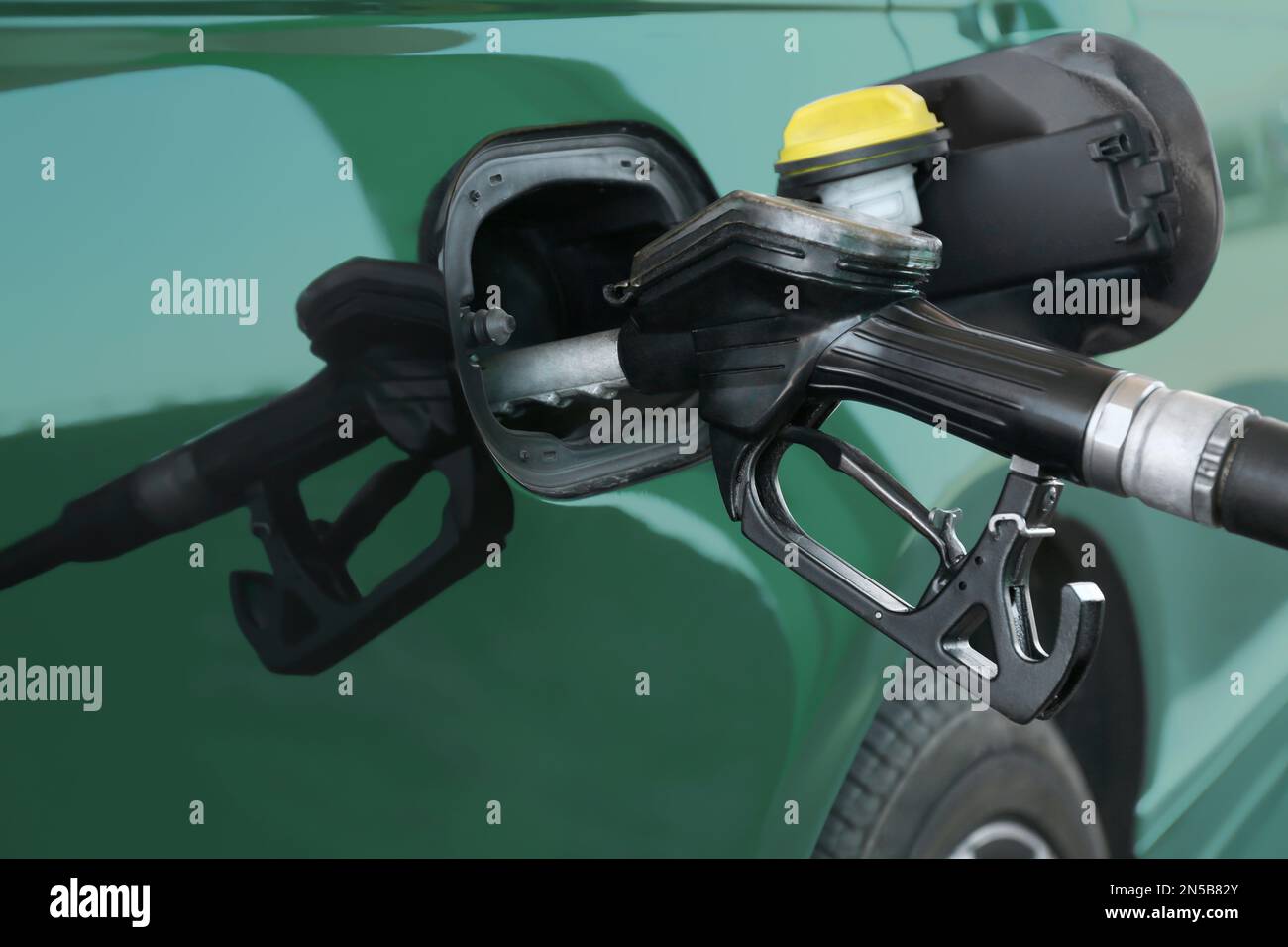 Refilling car with fuel at gas station, closeup Stock Photo - Alamy
