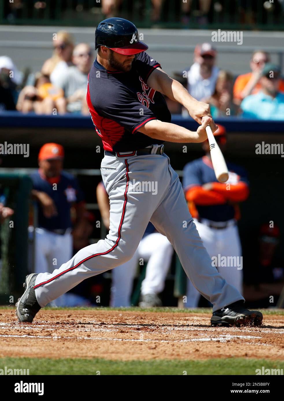 Atlanta Braves catcher Evan Gattis (24) bats in a spring exhibition ...