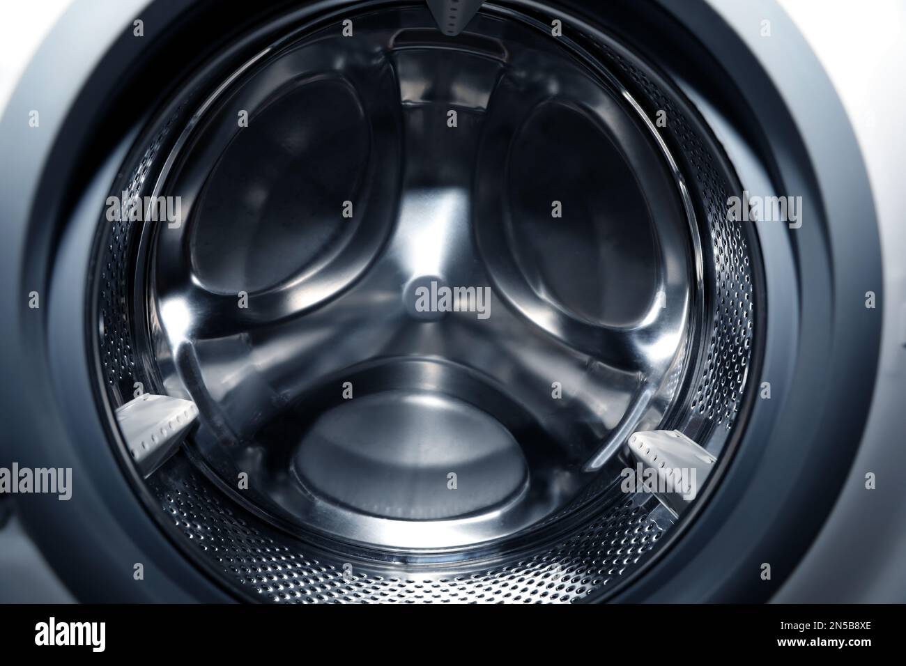 Empty washing machine drum, closeup. Laundry day Stock Photo - Alamy