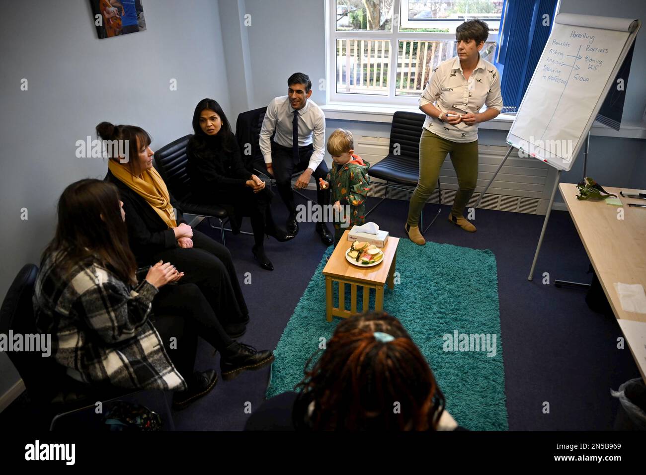 Prime Minister Rishi Sunak and his wife Akshata Murty (third from left ...
