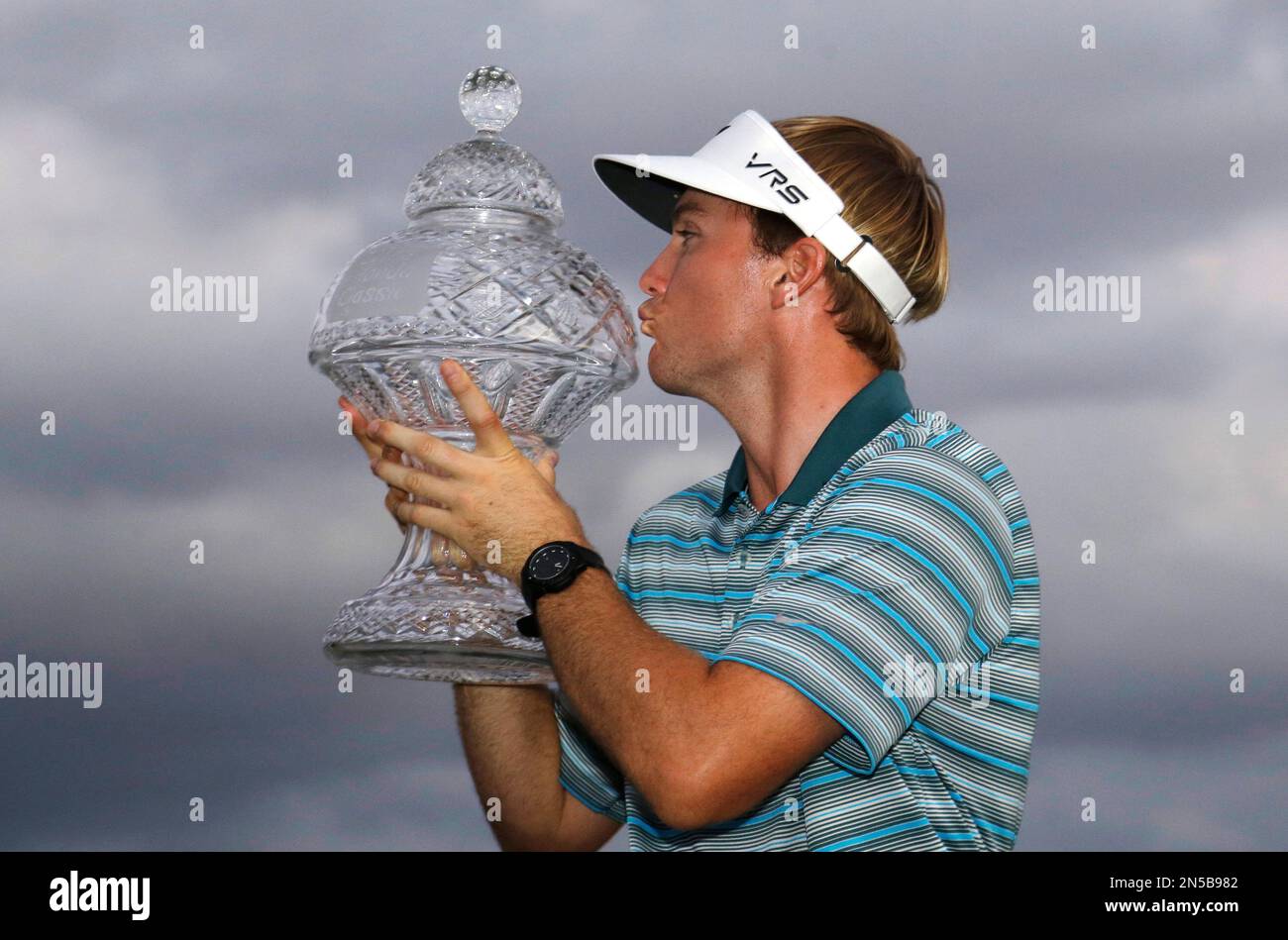 Russell Henley kisses the trophy after winning the Honda Classic golf ...