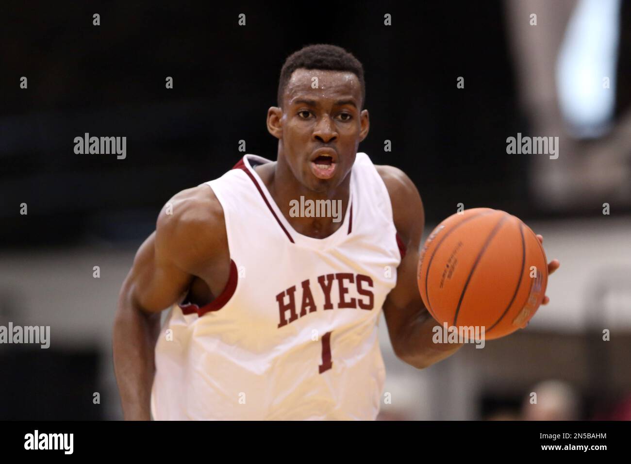 Cardinal Hayes Nathan Ekwu #1 in action against the Holy Cross Knights ...