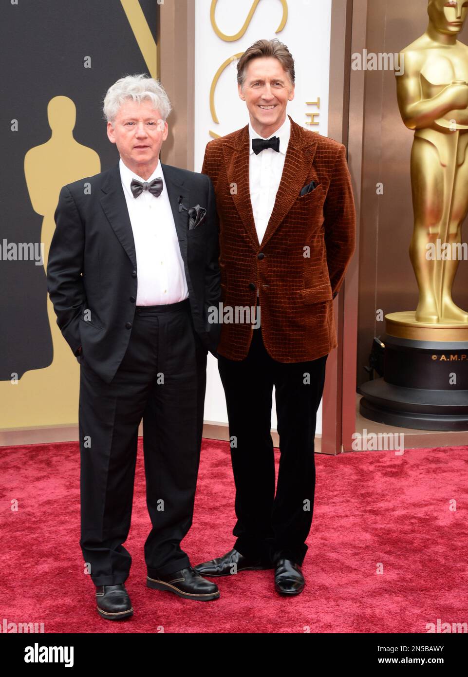 Malcolm Clarke, left, and Nicholas Reed arrive at the Oscars on Sunday ...