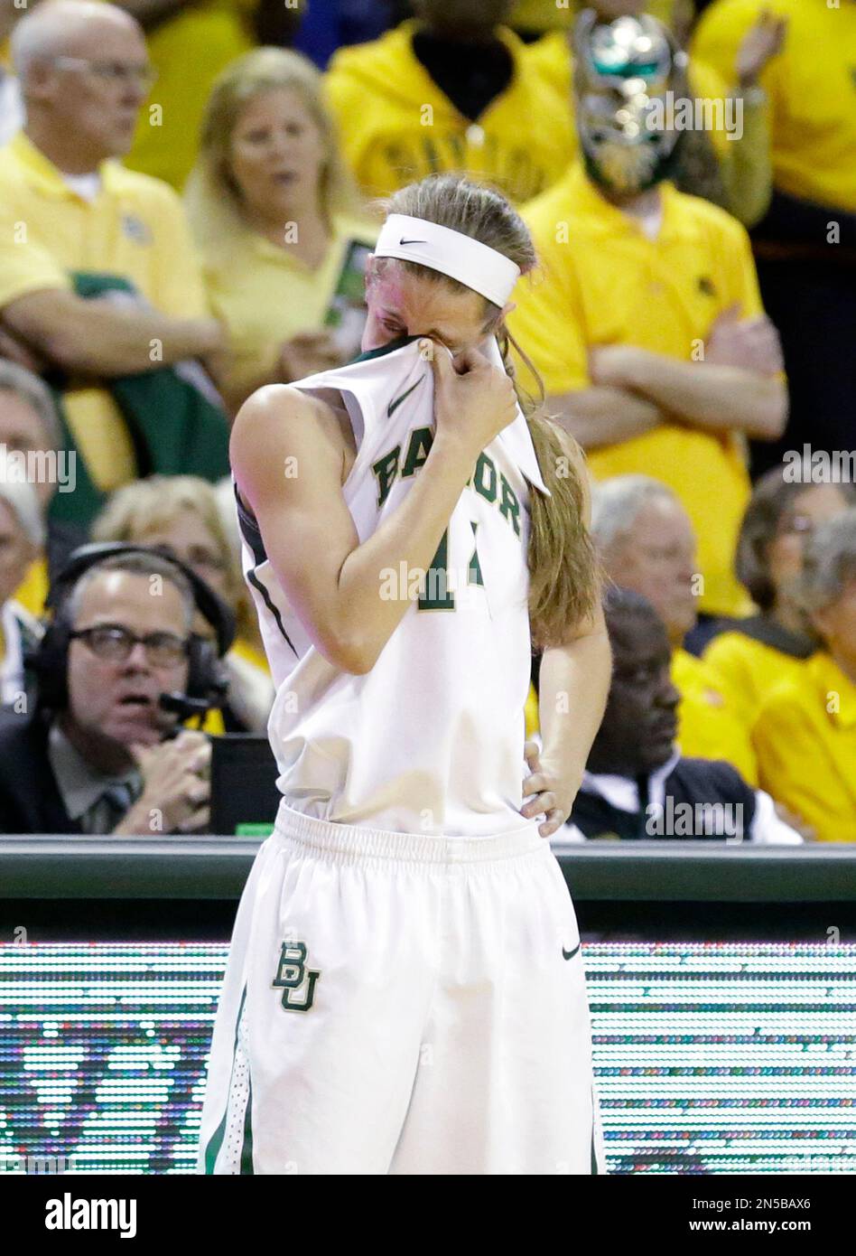 Baylor guard Makenzie Robertson (14) wipes her eyes as she leaves in ...
