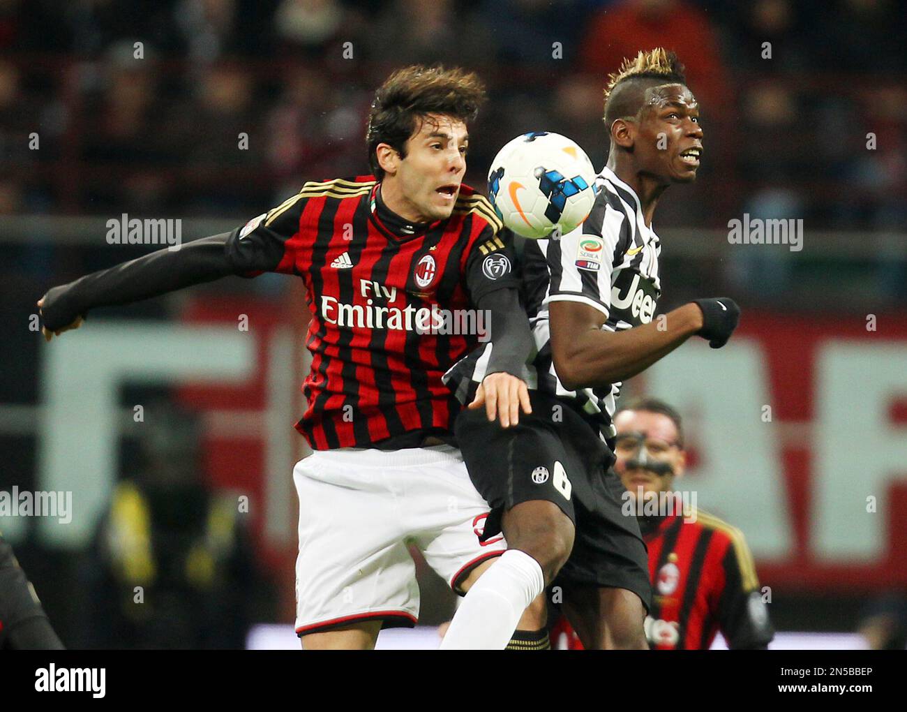 AC Milan Brazilian forward Kaka, left, jumps for the ball with Juventus ...