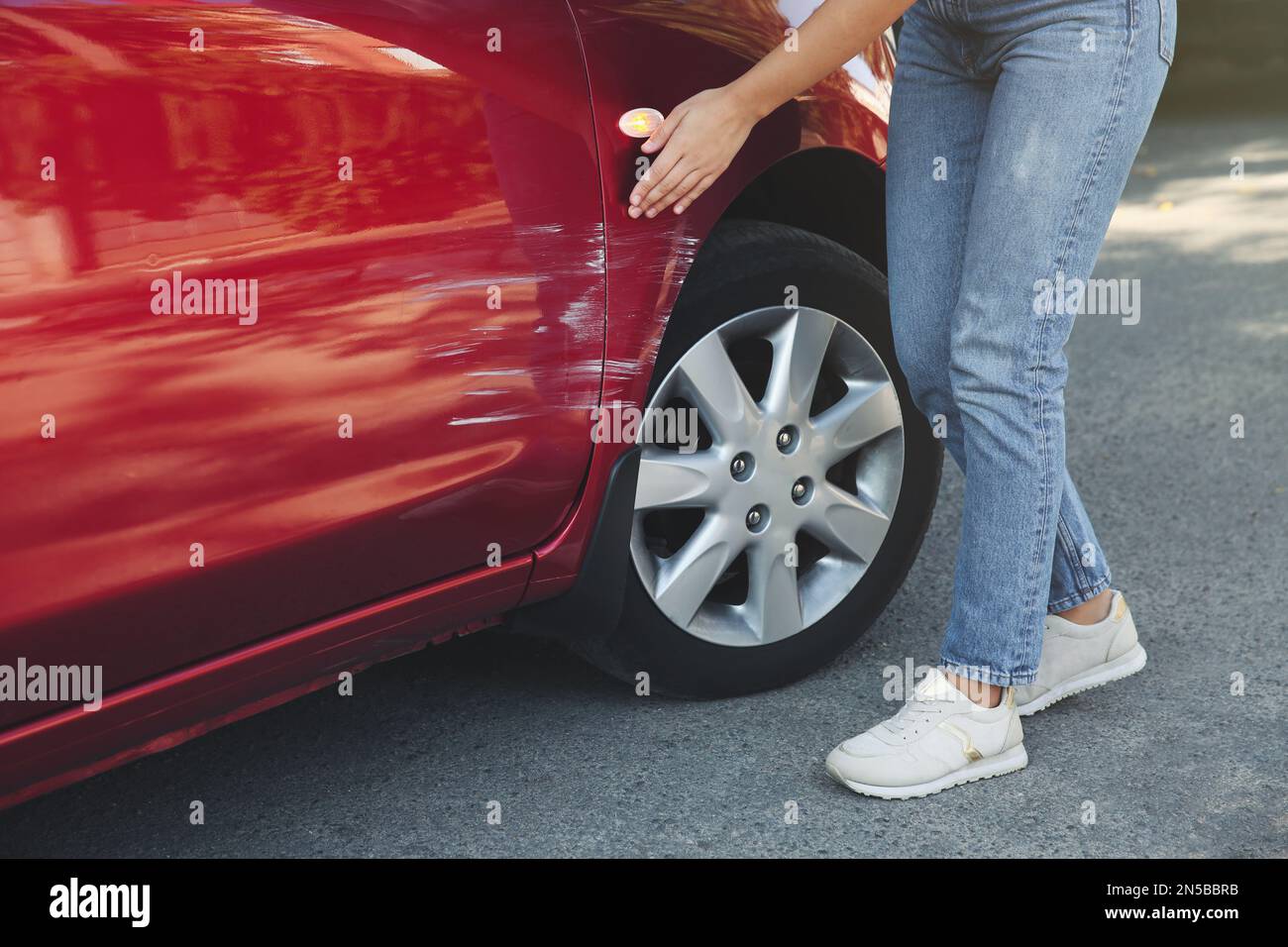 Young woman near car hi-res stock photography and images - Alamy
