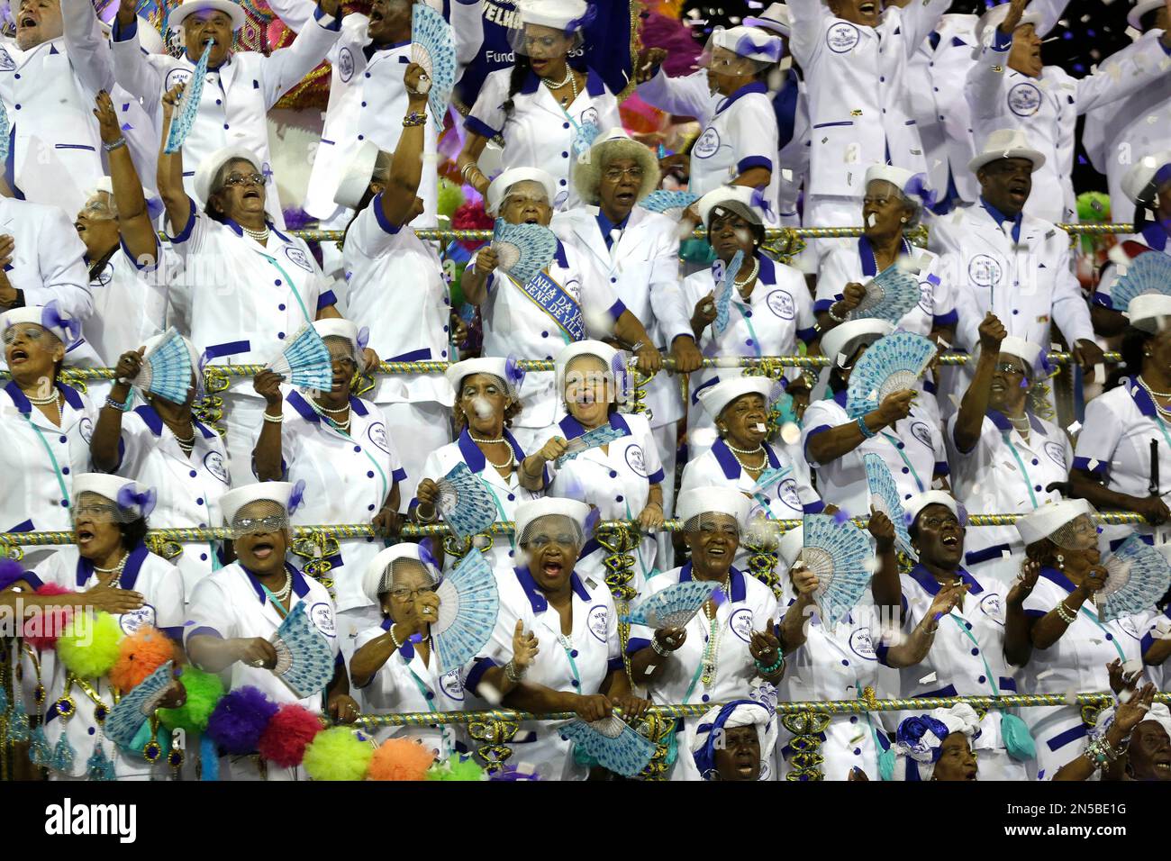 Dancers from the Nene de Vila Matilde samba school perform on a float ...