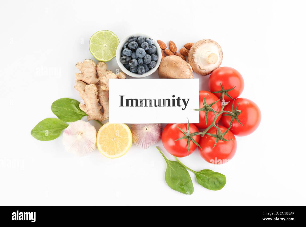 Set of natural products and card with word Immunity on white background ...