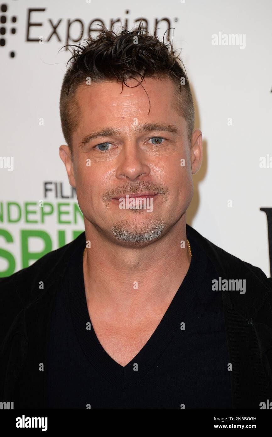 Brad Pitt poses in the press room at the 2014 Film Independent Spirit ...