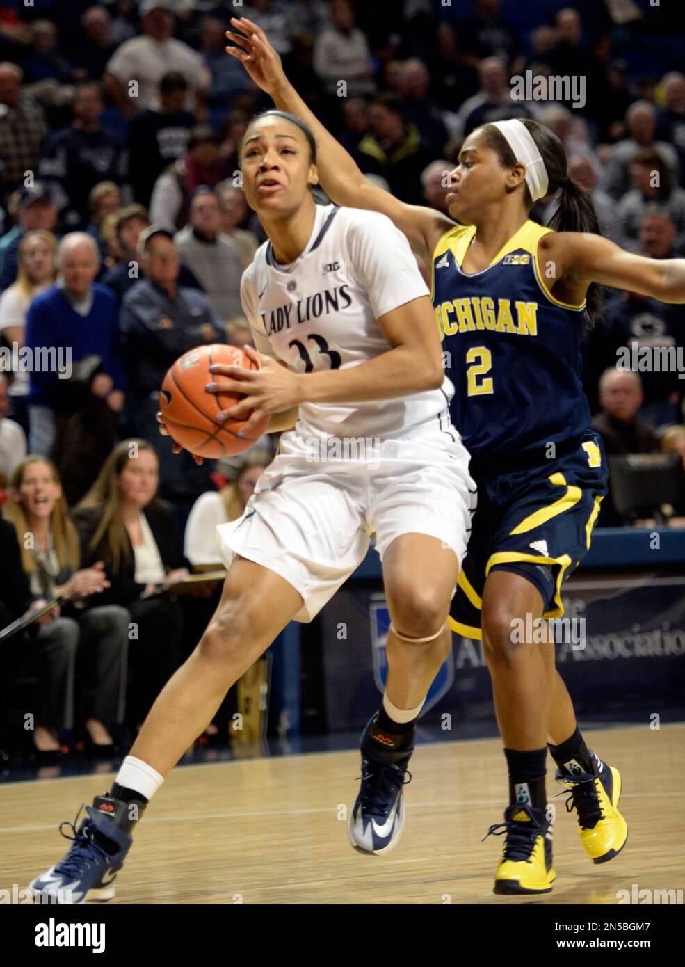 Penn State's Ariel Edwards (23) drives to the basket past Michigan's ...