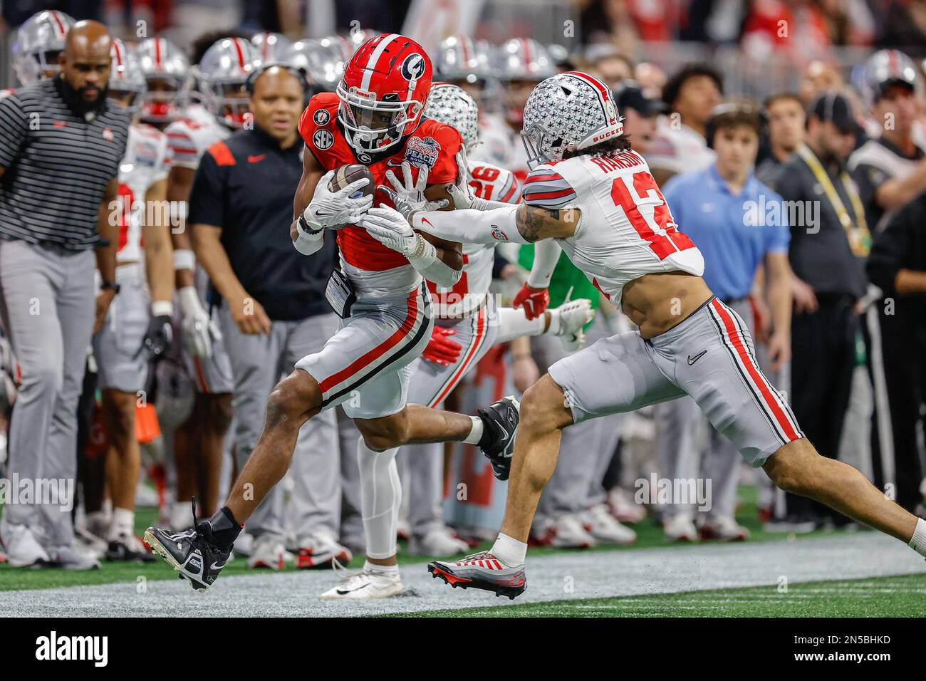 December 31, 2022: Georgia's Adonai Mitchell (5) is taken out of bounds ...