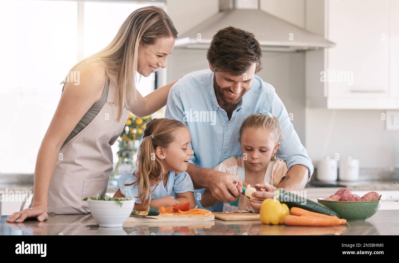 Kitchen, family and parents with children cooking with vegetables for nutrition, healthy food or ...